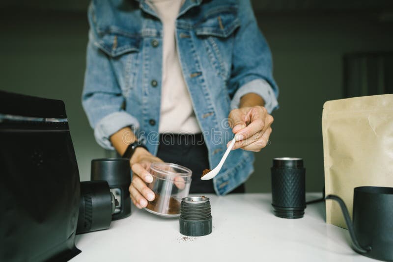 Prepare of Hand Using Spoon Scooping Roasted Coffee Bean in Put ...