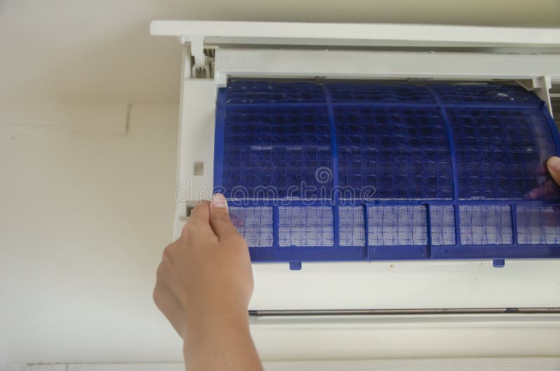 Prepare To Clean the Air Conditioner Filter from Dust Stock Photo ...