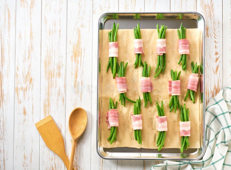 Prepared To Bake Appetizer, Bundle of Green Beans Wrapped in Bacon on a ...