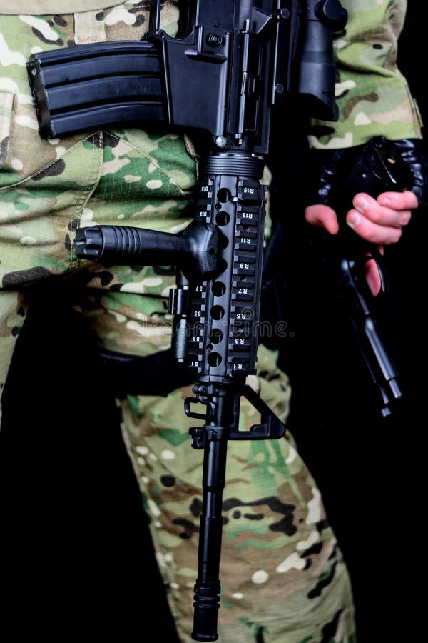 Prepared with weapons stock image. Image of officer, camouflage - 46141141