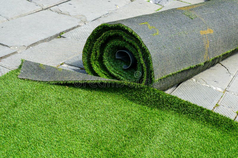 Preparing Artificial Grass Carpet Rolls for Outdoor Event Flooring in ...