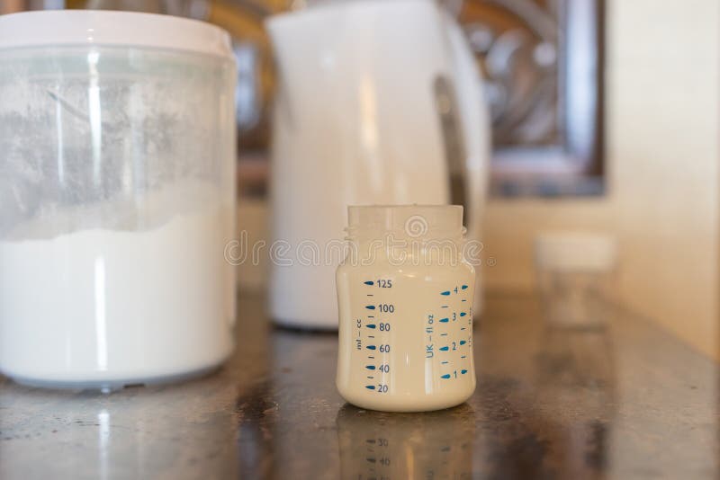 Preparing Baby Bottle of Powdered Milk on Table Stock Image - Image of ...