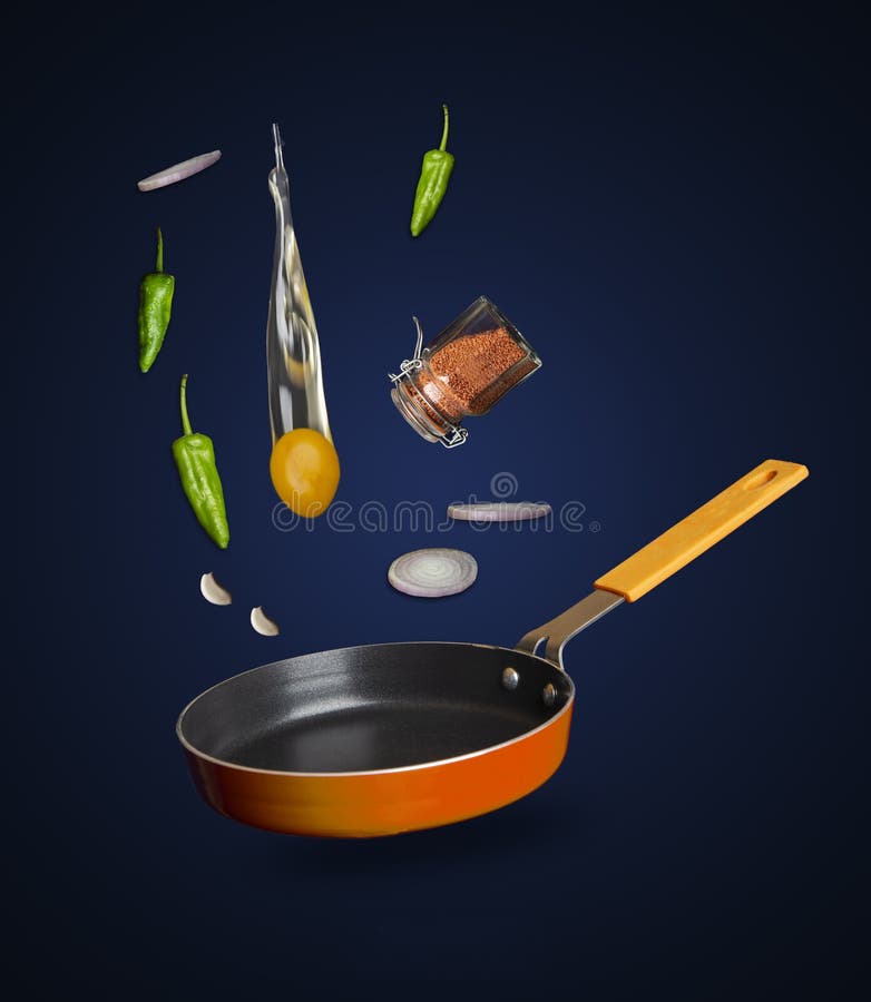 Preparing a Breakfast Shown Via Eggs Ingredient Falling into the Frying ...