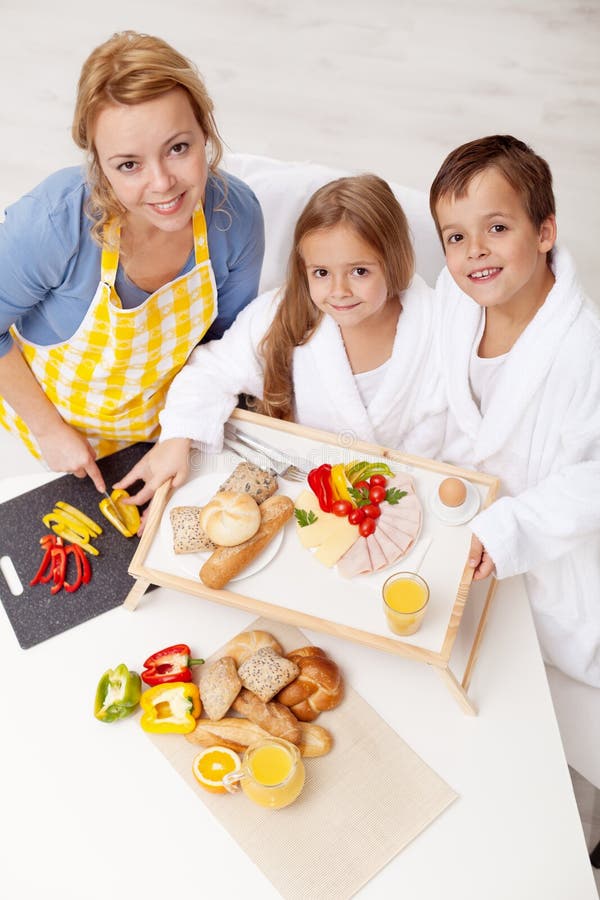 Preparing Breakfast Together Stock Image - Image of hungry, happy: 22330789