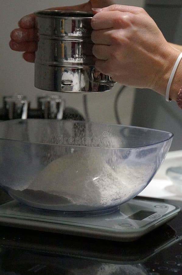 Preparing a Cake, Adding Flour Stock Photo - Image of bake, preparation ...