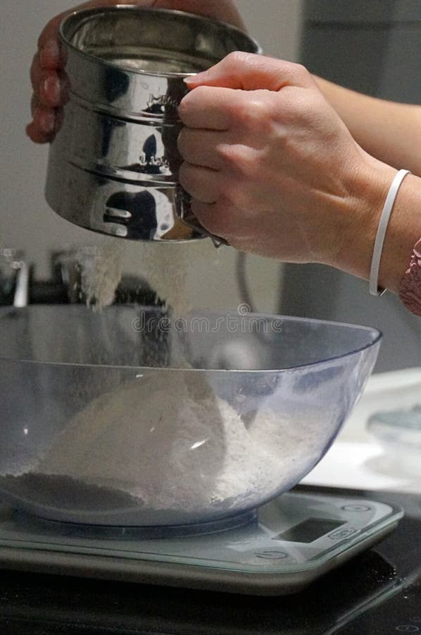 Preparing a Cake, Adding Flour Stock Photo - Image of making, kitchen ...