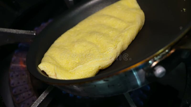 Preparing a Cheese Omelette Roll To Top Risotto Stock Image - Image of ...