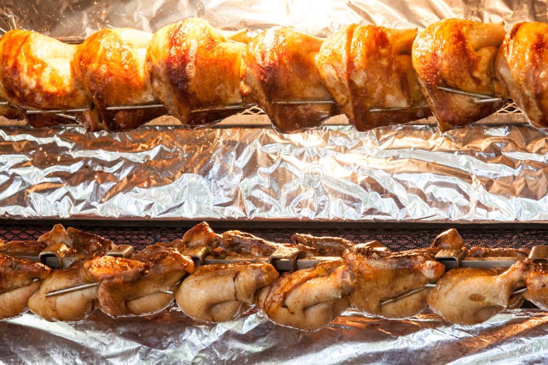 The Preparing Chicken Grill on a Spit in an Oven Stock Photo - Image of ...