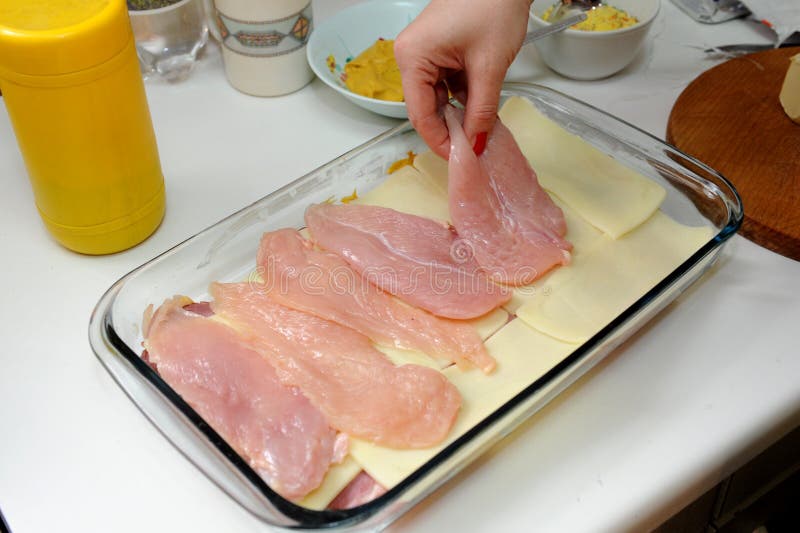 Preparing Chicken Specialties with Cheese Stock Photo - Image of cook ...