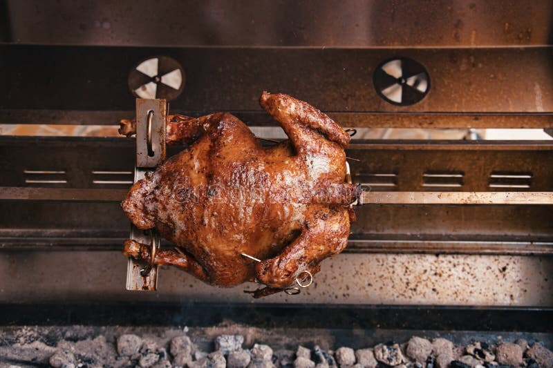 Preparing Chicken on a Spit Stock Photo - Image of cuisine, closeup ...