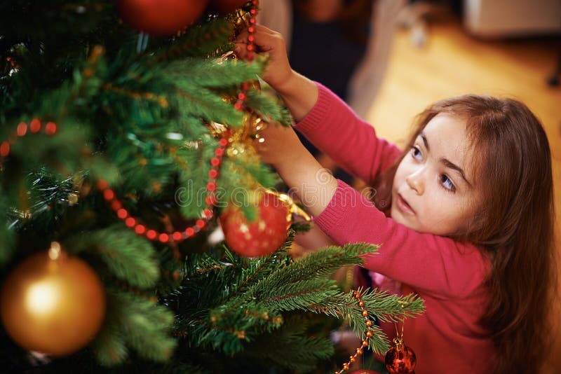 Preparing Christmas tree stock photo. Image of cute, christmastime ...
