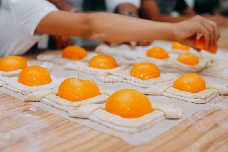 Preparing a Dessert at a Cooking Master Class. Baskets with Peaches and ...
