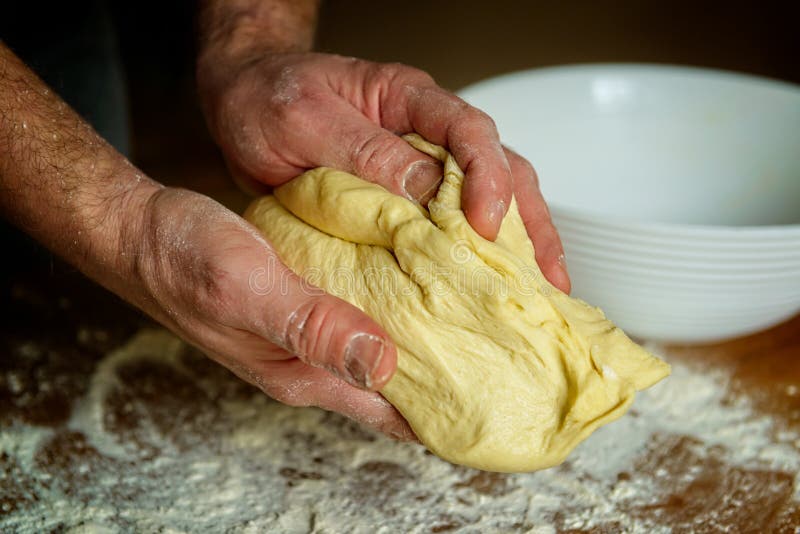 Preparing dough for bread stock image. Image of human - 212215215