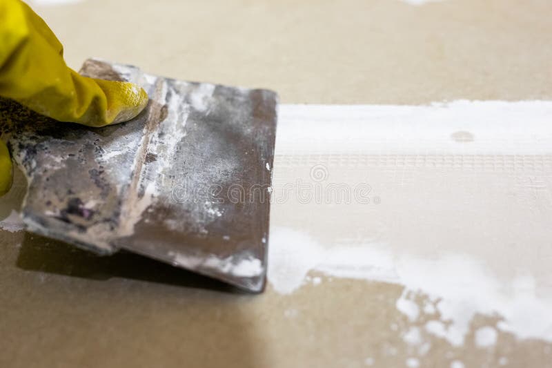 Preparing Drywall for Plastering. the Craftsman Cleans and Sands the ...