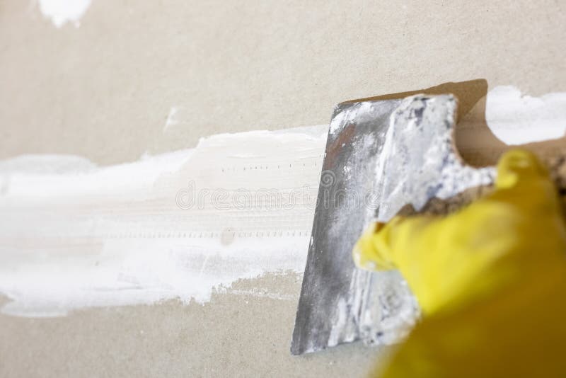 Preparing Drywall for Plastering. the Craftsman Cleans and Sands the ...