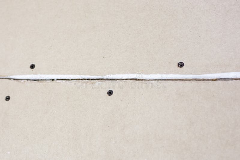 Preparing Drywall for Putty and Plaster. the Embroidered Edge of the ...