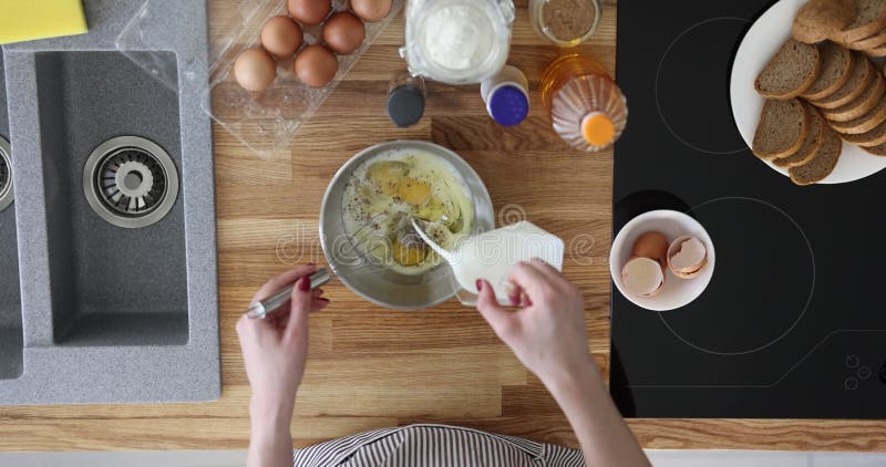 Preparing Eggs and Milk for Breakfast in Kitchen Stock Footage - Video ...