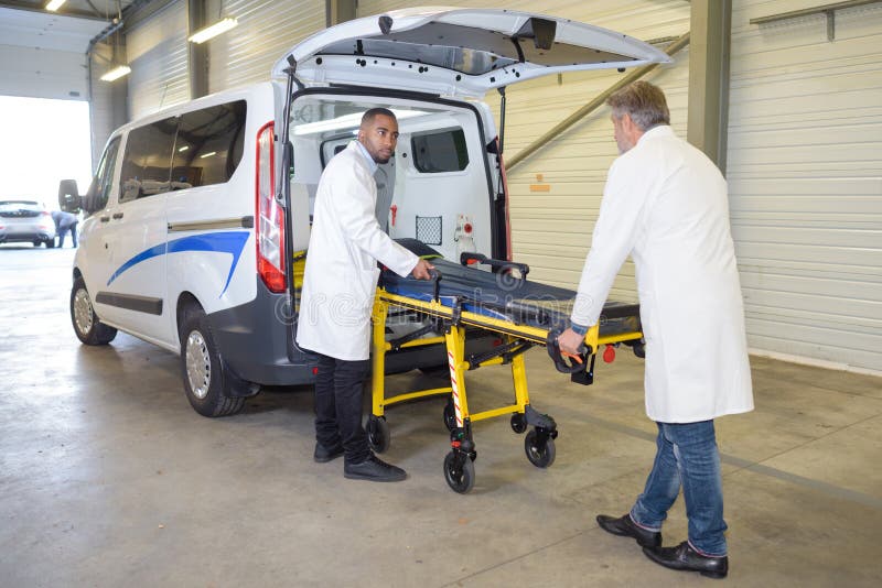Preparing the Emergency Bed Stock Photo - Image of technician, vital ...