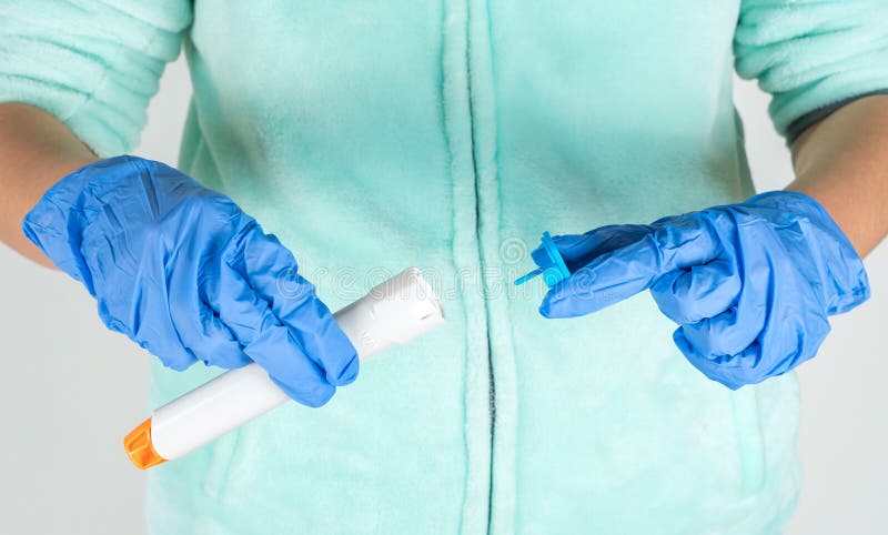 Preparing Epinephrine Injector To Use Stock Photo - Image of emergency ...