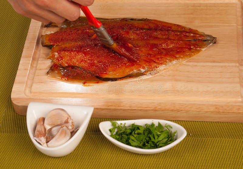 Preparing fish stock image. Image of board, saltfish - 26334713