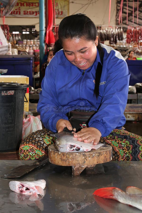 Preparing fish on Market editorial stock photo. Image of people - 28297268