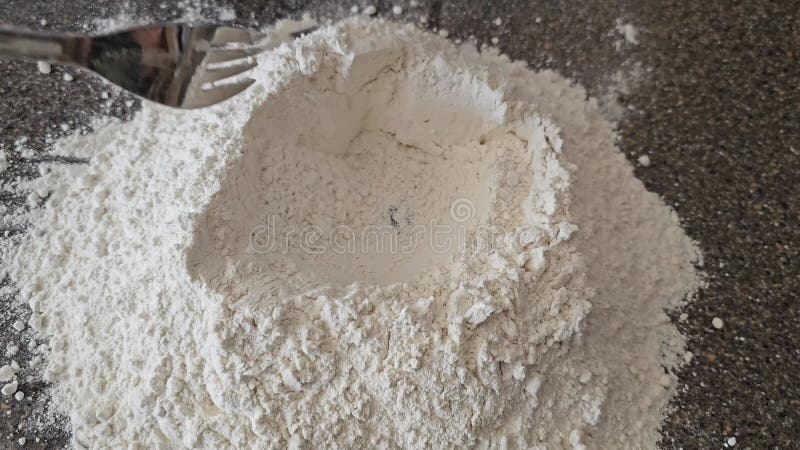 Preparing Flour Pile on Kitchen Counter for Pasta Making Stock Footage ...