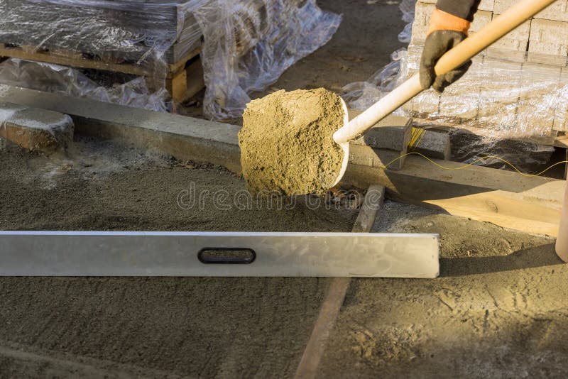 Preparing a Footpath for Decorative Stone by Leveling Sand Stock Image ...