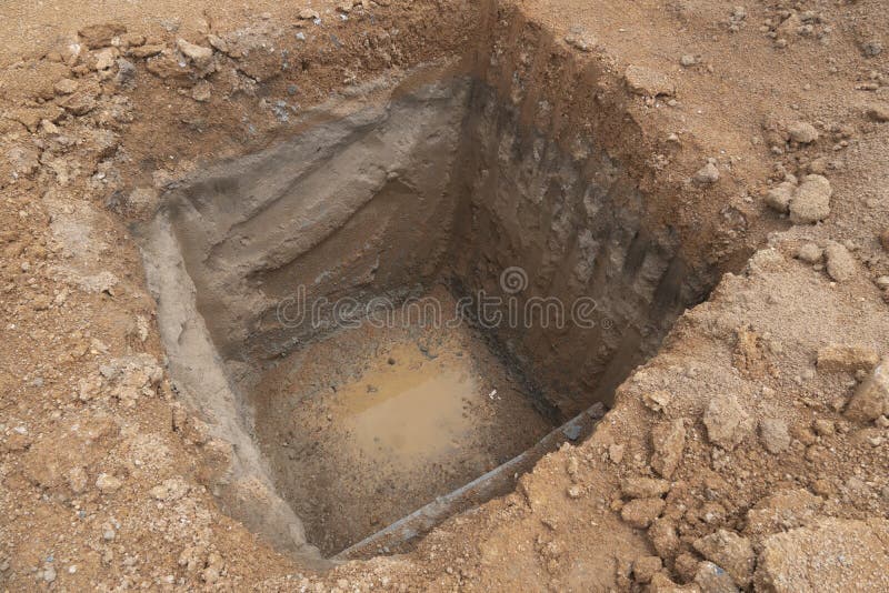 Preparing the Foundation on the Ground for Construction Columns Digging ...