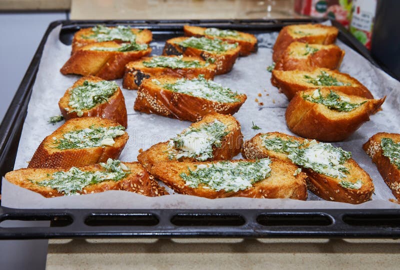 Preparing Fresh Garlic Bread in Oven Stock Image - Image of baking ...