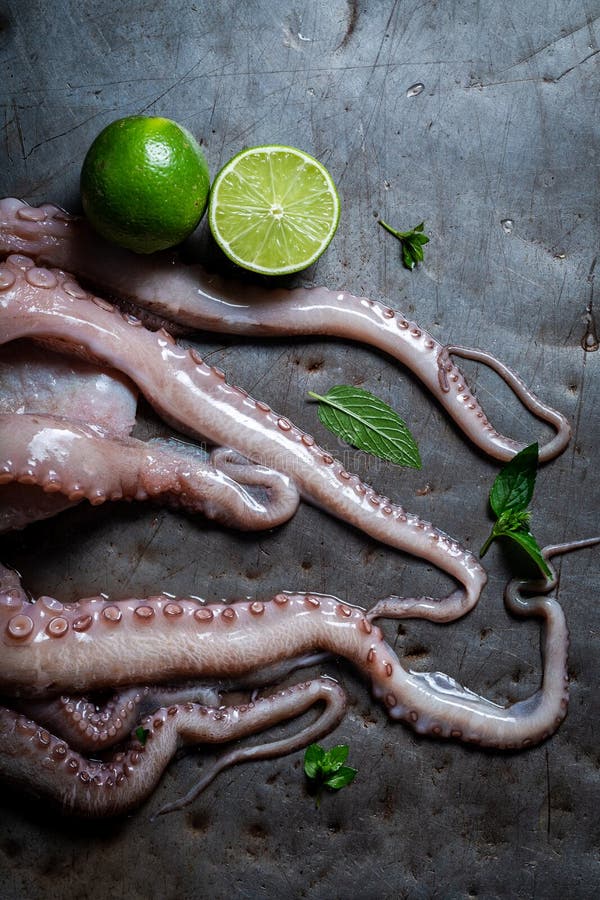 Preparing Fresh Octopus on Metal Table Stock Photo - Image of cooked ...