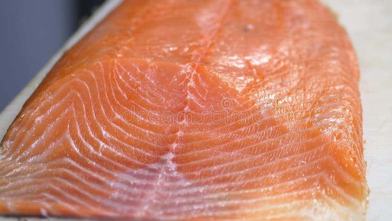 Preparing Fresh Salmon Fillet in a Kitchen Setting Stock Video - Video ...