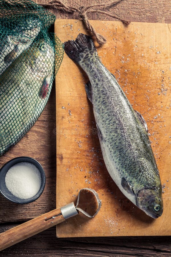 Preparing Freshly Caught Trout Stock Image - Image of catch, cutting ...