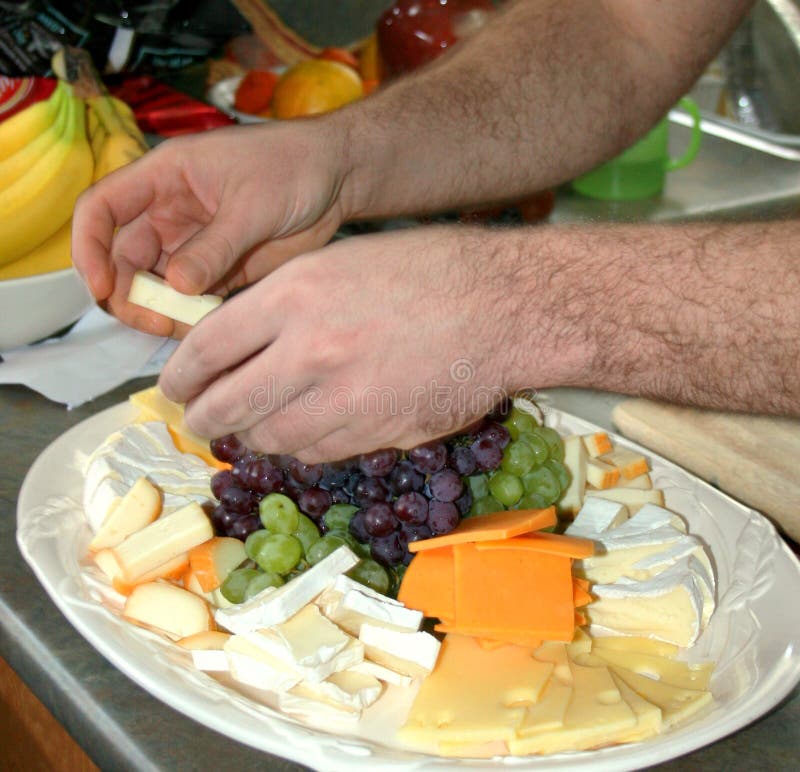 Preparing Fruit and Cheese Platter Stock Photo - Image of cheese ...
