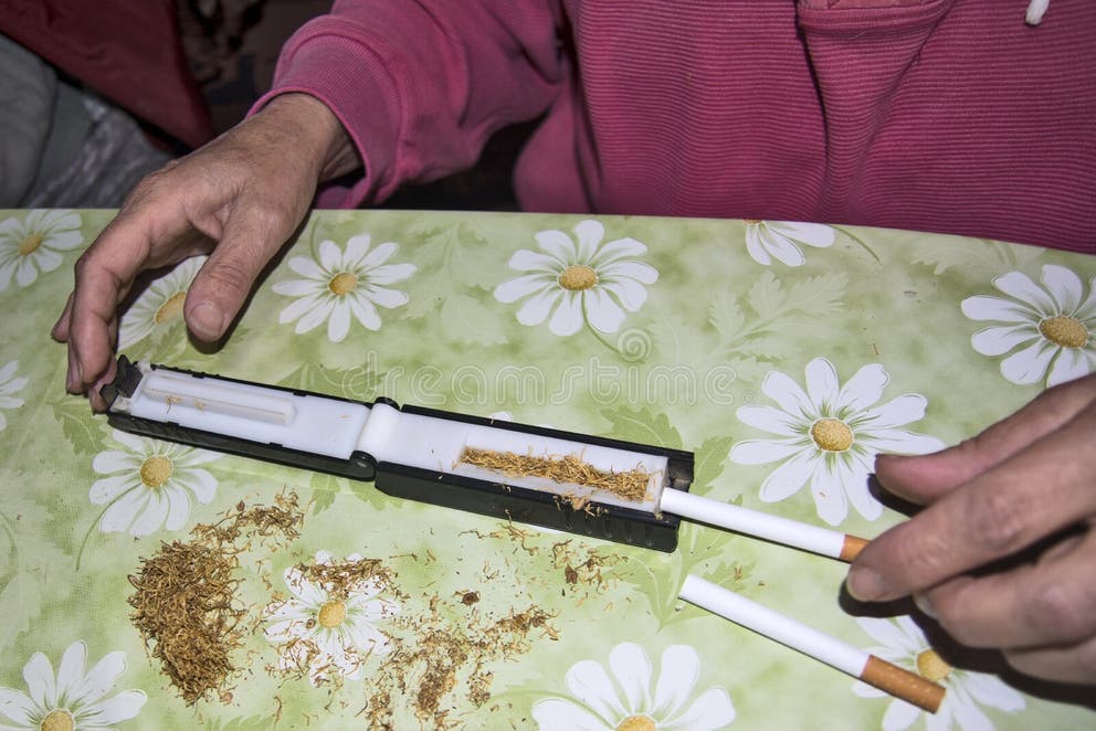 Preparing Handmade Cigarettes Stock Image - Image of hands, cutting ...