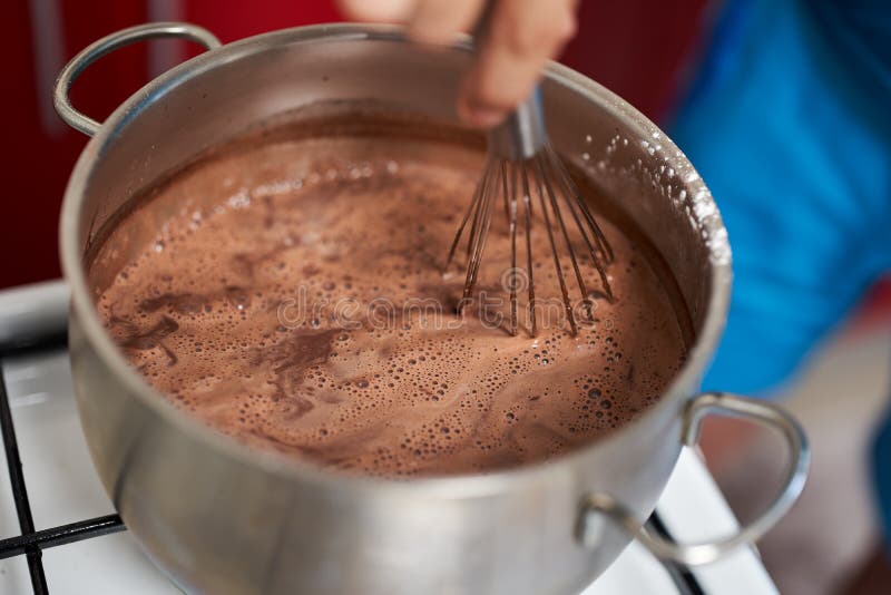 Preparing Homemade Chocolate Pudding, Closeup on Hands Stock Image ...