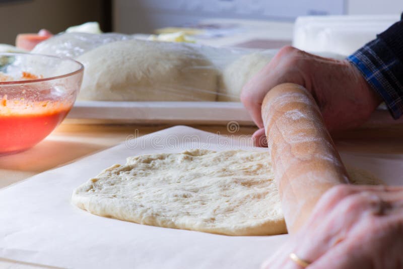 Preparing homemade pizza stock image. Image of flour - 74226823
