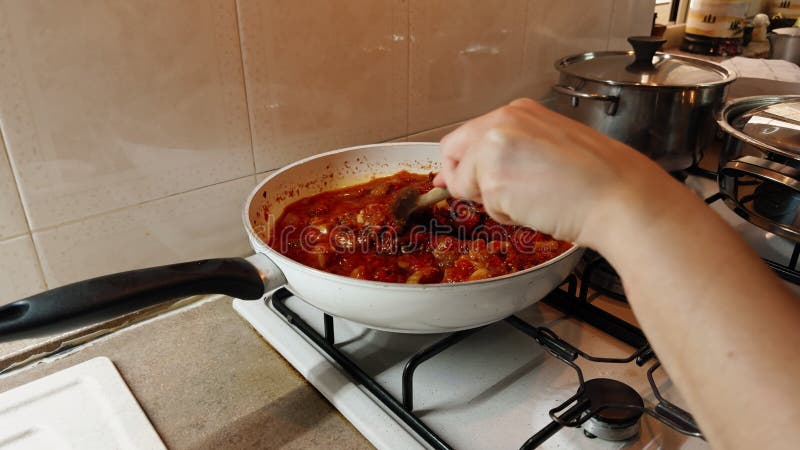 Preparing an Italian Traditional Sauce in the Pan Stock Video - Video ...