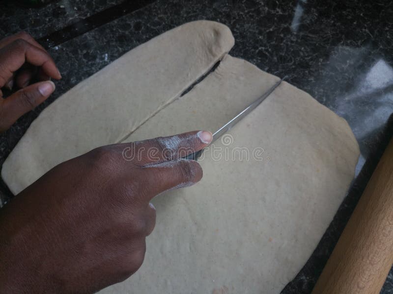 Female African Hand Cutting Mandazi Dough Stock Photo - Image of ...