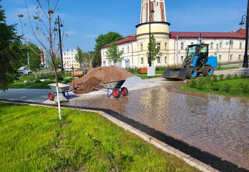 Preparing for the Landscaping of the Park, There is a Sandbarrow and a ...