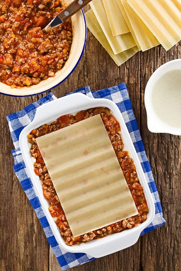Preparing Lasagna stock image. Image of ground, ragu - 280895457