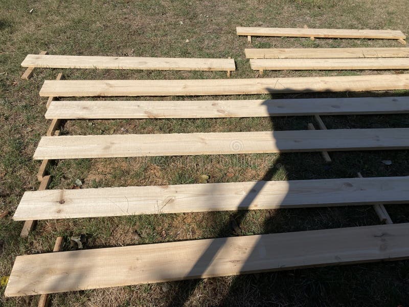 Preparing Lumber for Priming and Painting Stock Image - Image of brush ...