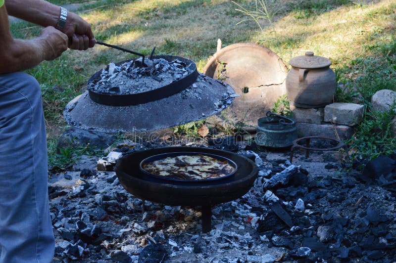 Preparing Lunch in the Village on the Fire in the Yard Stock Photo ...