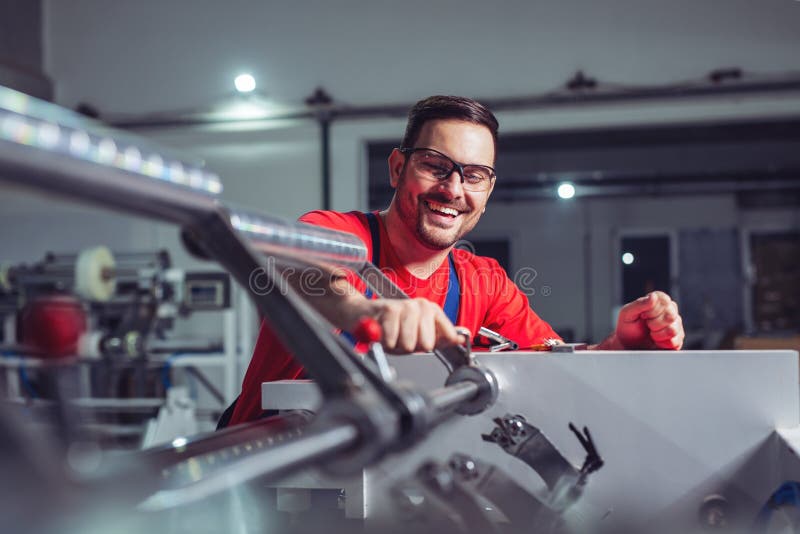 Preparing Machine for Printing. Maintenance Engineer Repair Modern ...