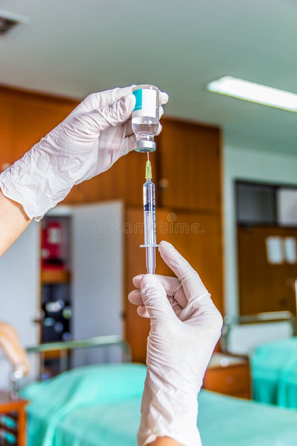 Preparing a Medicine Injection Stock Image - Image of glove, glass ...