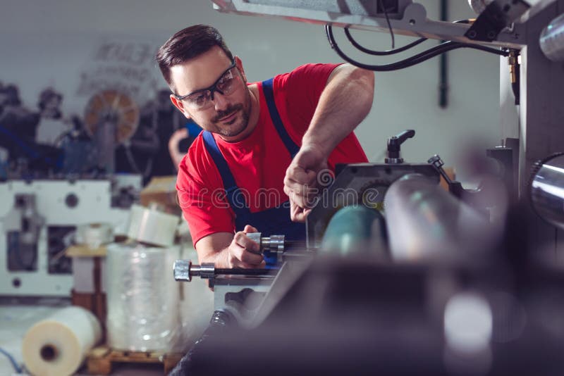 Preparing Machine for Printing. Maintenance Engineer Repair Modern ...