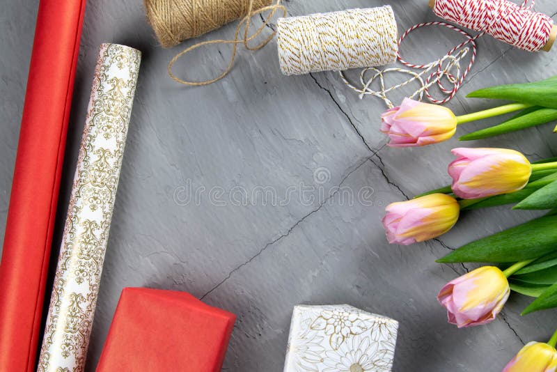 Preparing for the Packaging of Gifts, on the Table Laid Out Red and ...