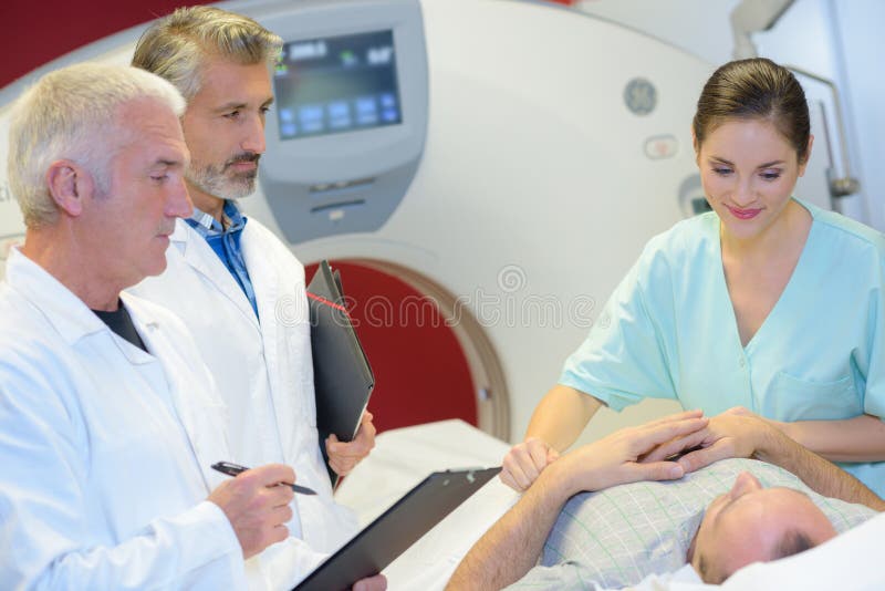 Preparing patient for mri stock photo. Image of scanner - 117261848