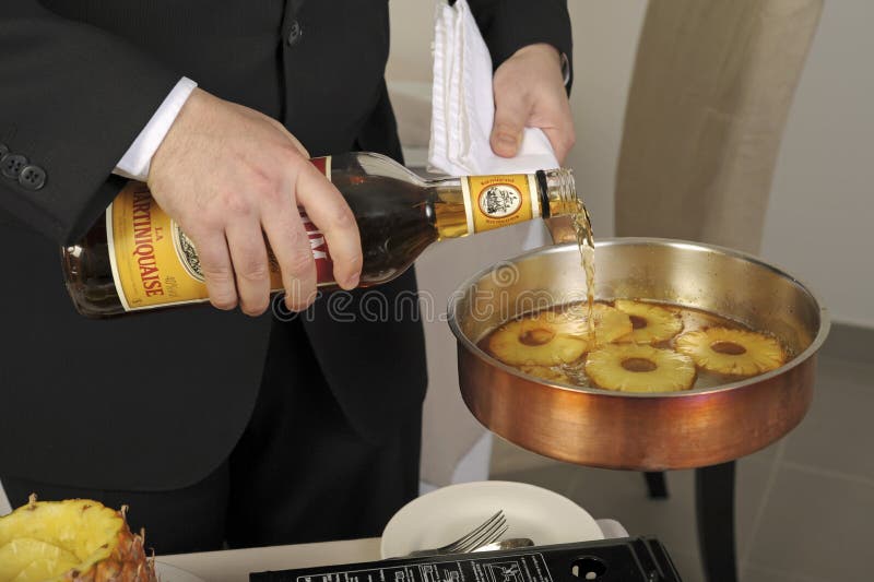 Preparing a Pineapple Flamb Editorial Photography - Image of warmer ...