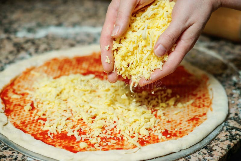Preparing Pizza, Cook Adds Cheese Stock Image - Image of delicious ...
