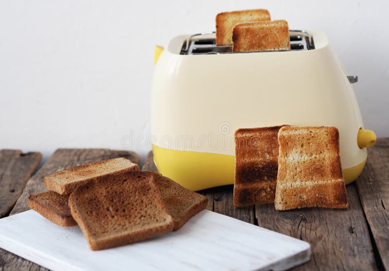 Preparing a Quick Breakfast. Homemade Toaster with Rye and White Bread ...